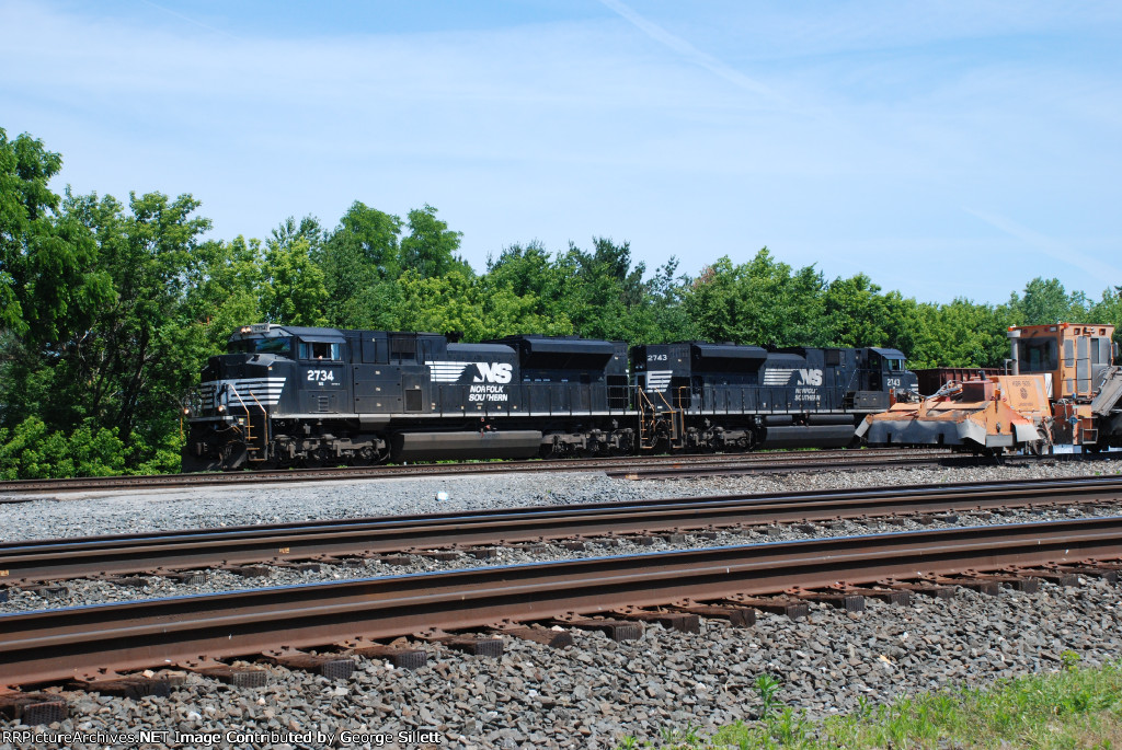 A pair of SD70M-2's power a coal train west.